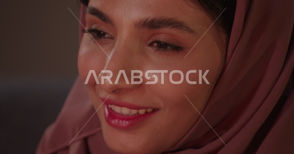 The concept of happiness and laughter, a close-up depiction of a Saudi ...