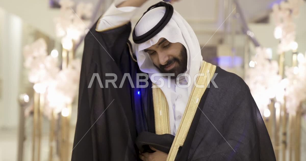 A young Saudi Arabian bridegroom in the Gulf for a photo session at his ...