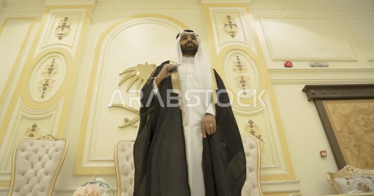 A young Saudi Gulf bridegroom with facial expressions indicating ...