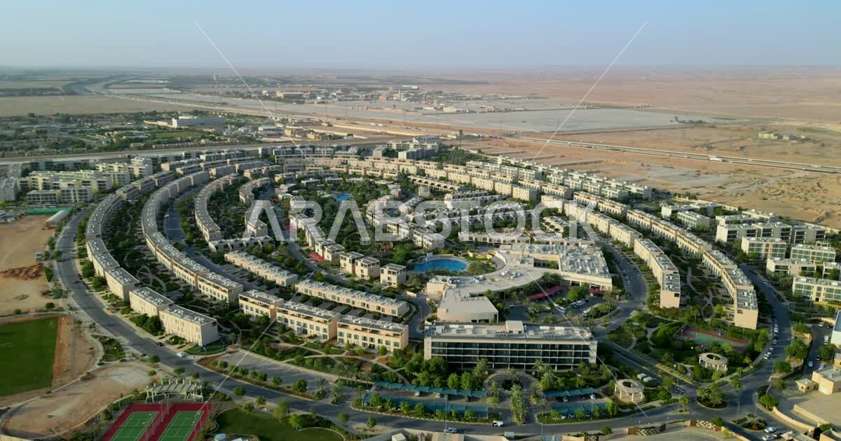 Trees and green plants in the gardens of luxury residential complexes ...