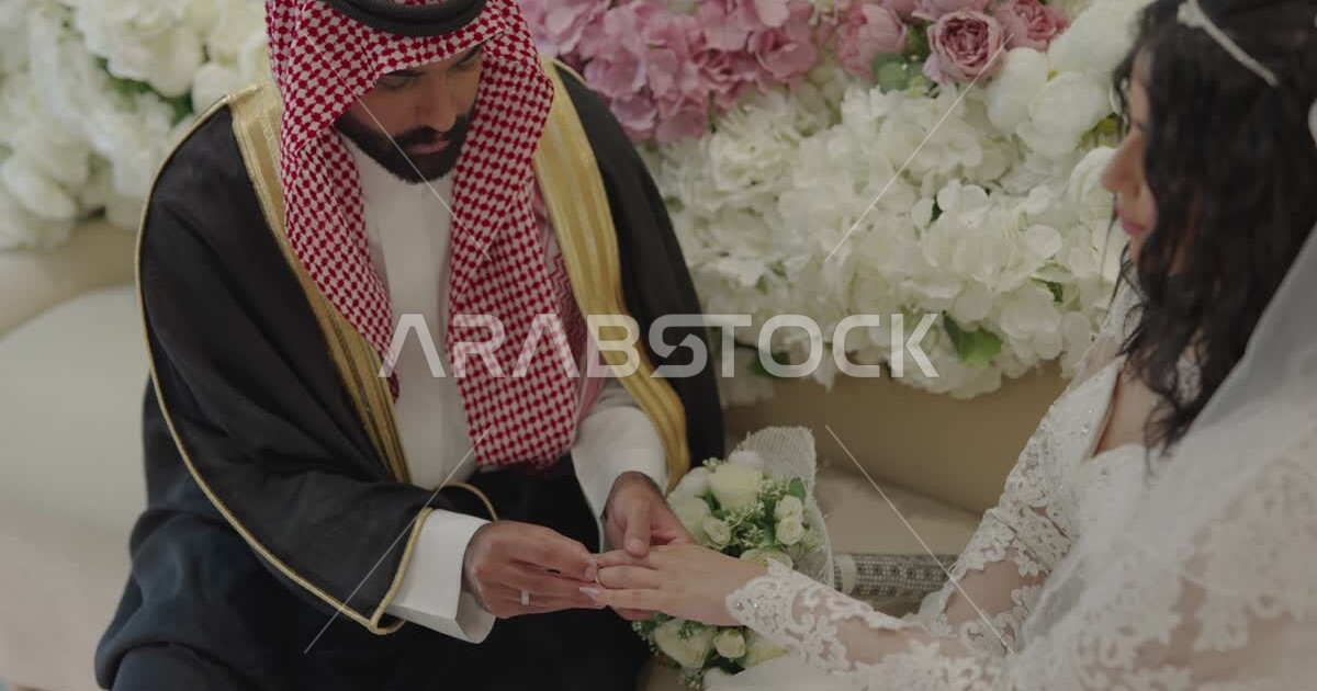 A photo session of two grooms on their wedding day, a close-up of a ...