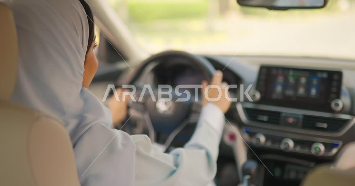 Freedom to drive for Arab women, a close-up photo from the back of a ...