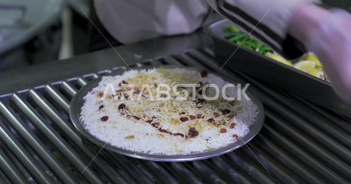 Traditional Saudi Arabian and Gulf foods ready to be served, preparing ...