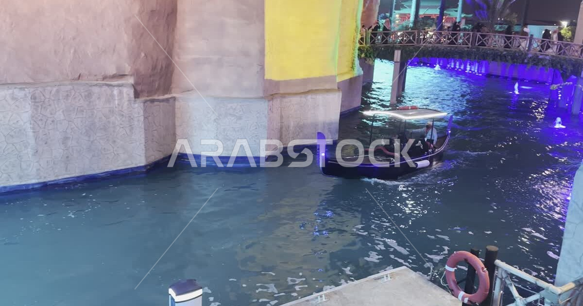Boats and canoes to transport visitors in the largest artificial lake ...