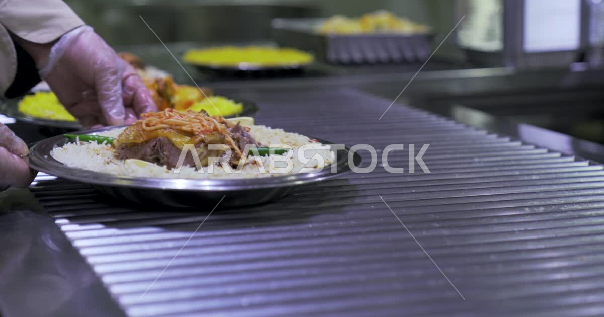 Traditional Saudi Arabian and Gulf foods ready to be served, preparing ...