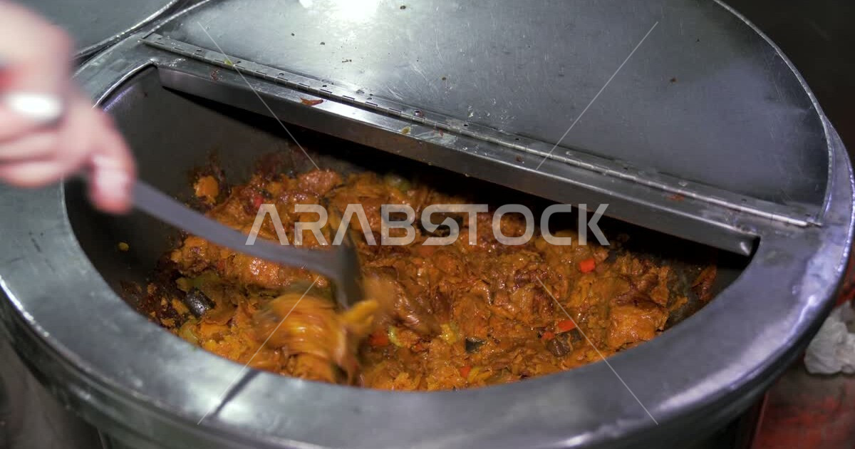 Saudi kitchen preparing the pirate, cooking the pirate with vegetables ...