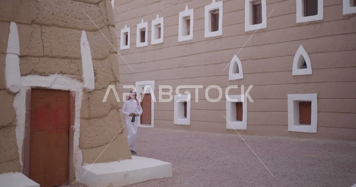 The historic Emirate Palace in the Aba Al-Saud neighborhood, a young ...