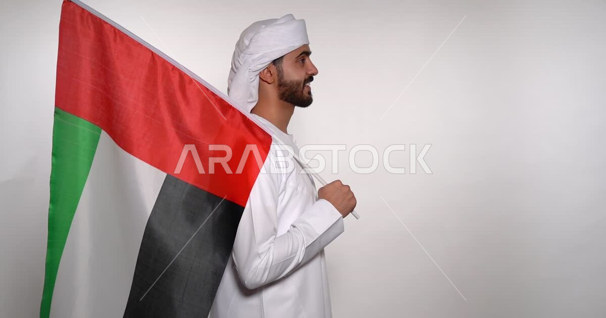 An Emirati man celebrates the National Day of the United Arab Emirates ...
