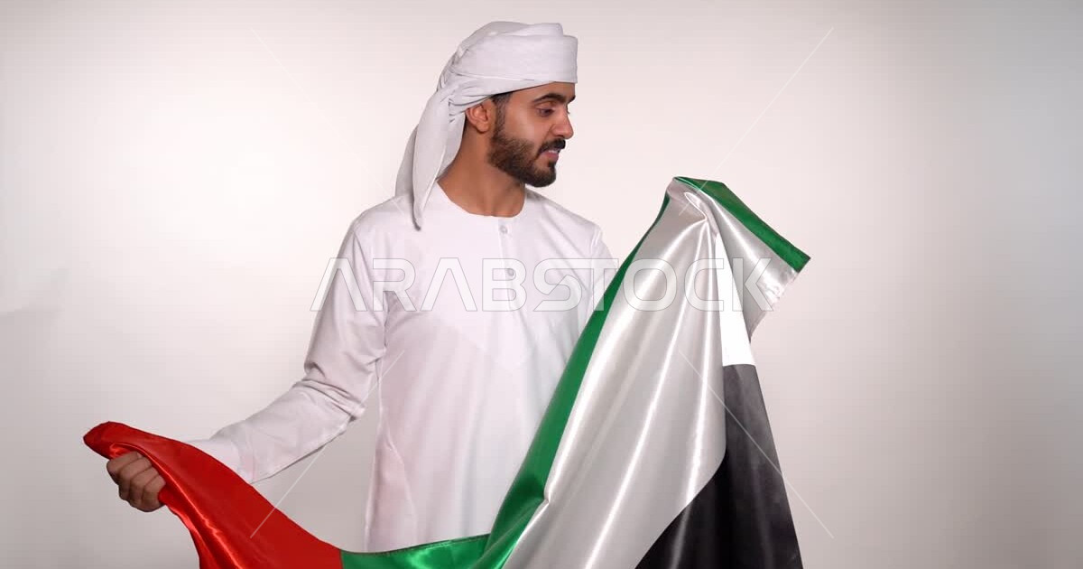 An Emirati man celebrates the National Day of the United Arab Emirates ...