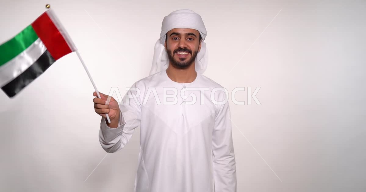 An Emirati man celebrates the National Day of the United Arab Emirates ...