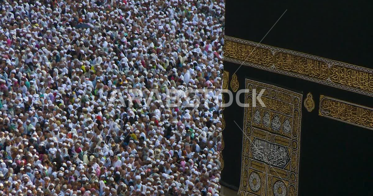 Pilgrims of the Holy House of God circumambulating the Holy Kaaba in ...