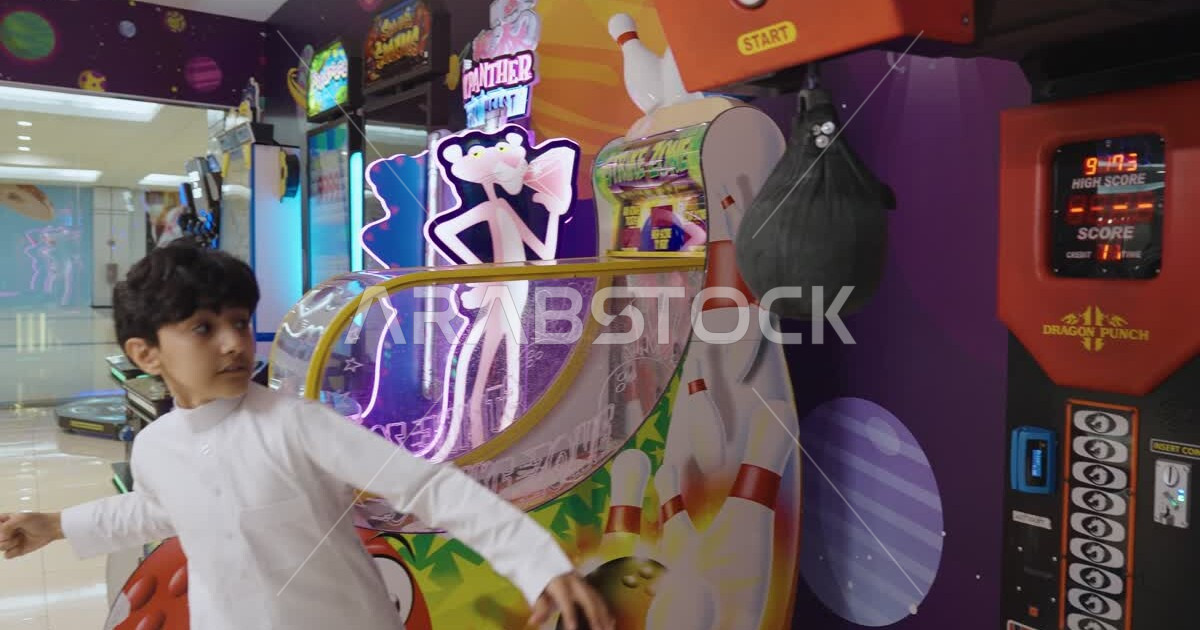 A group of electric arcade games in the Challenges and Adventures ...