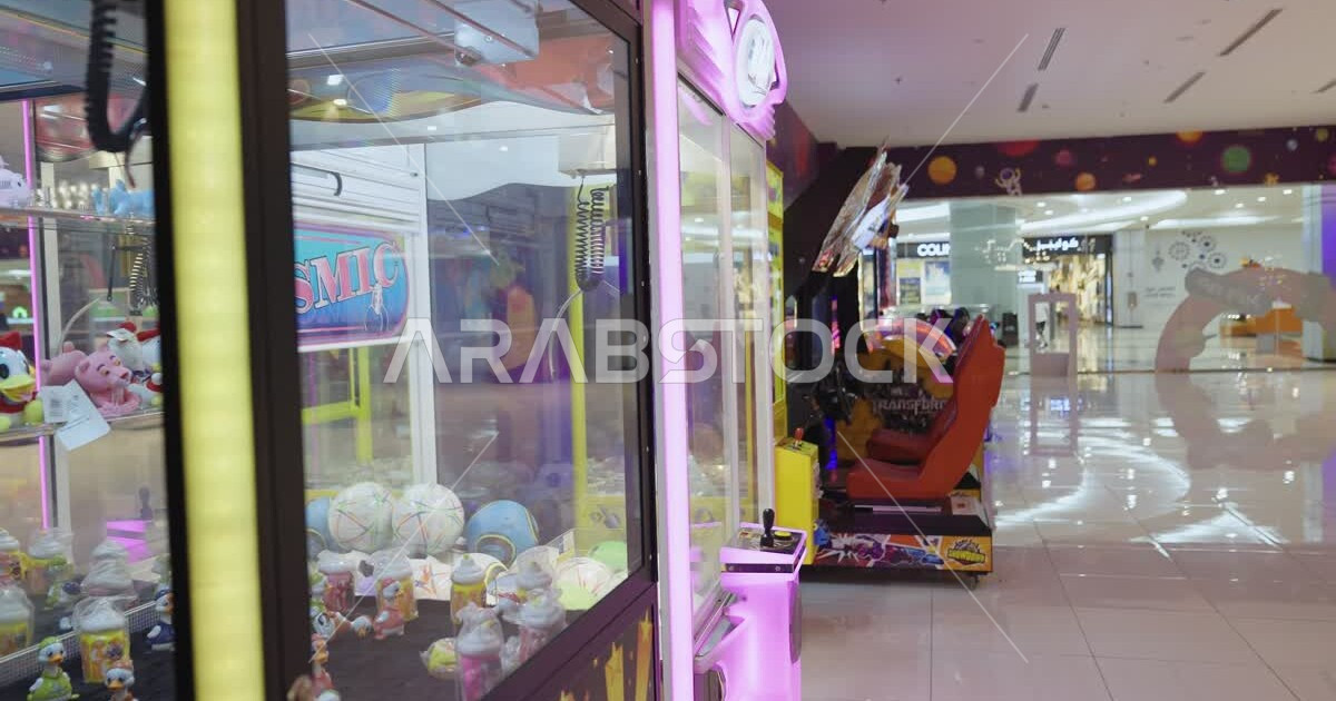 Enjoying a fun summer vacation, a variety of electronic arcade games ...