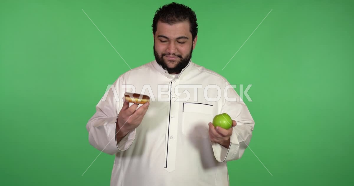 Portrait of a fat young Saudi Arabian Gulf man who is the best between ...