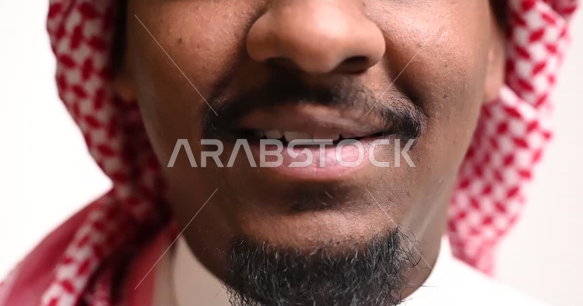 A smile with bright white teeth, looking at the camera with gestures of ...