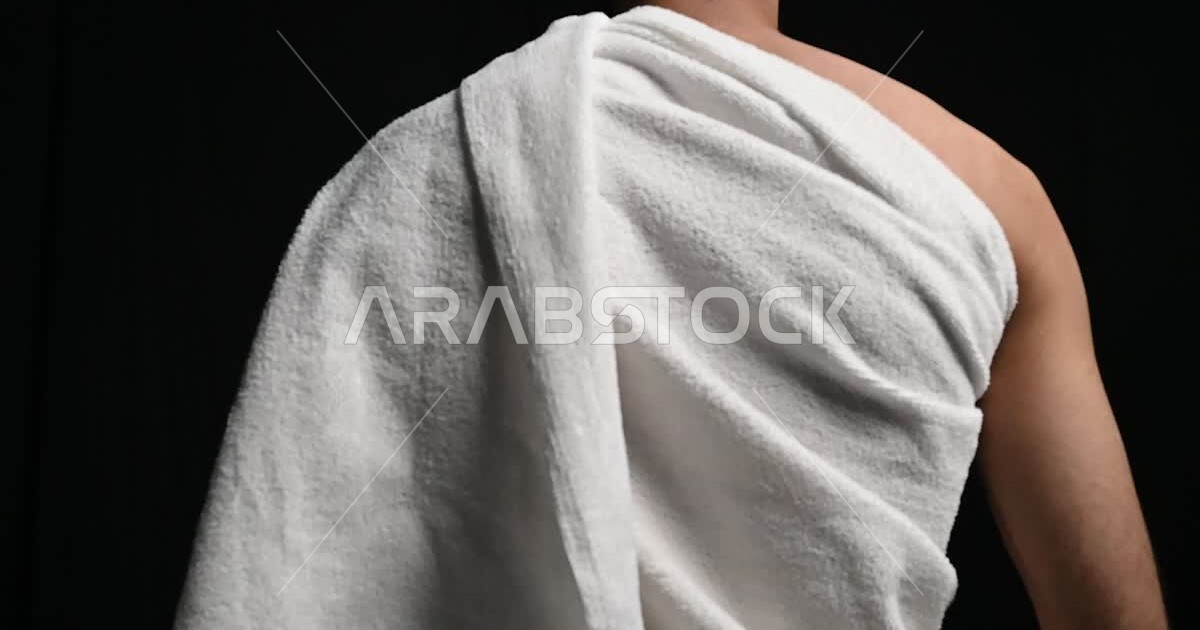 Performing the rituals of Hajj and Umrah, a close-up photograph from ...