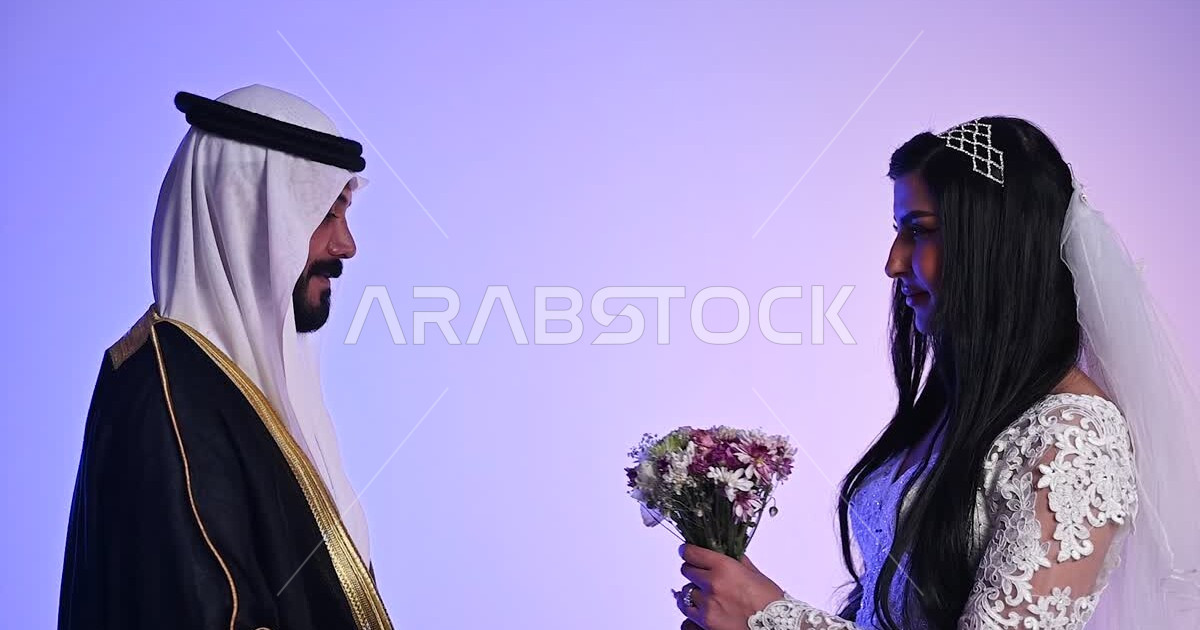 Entering the marital nest, a Saudi bride wearing a white wedding dress ...
