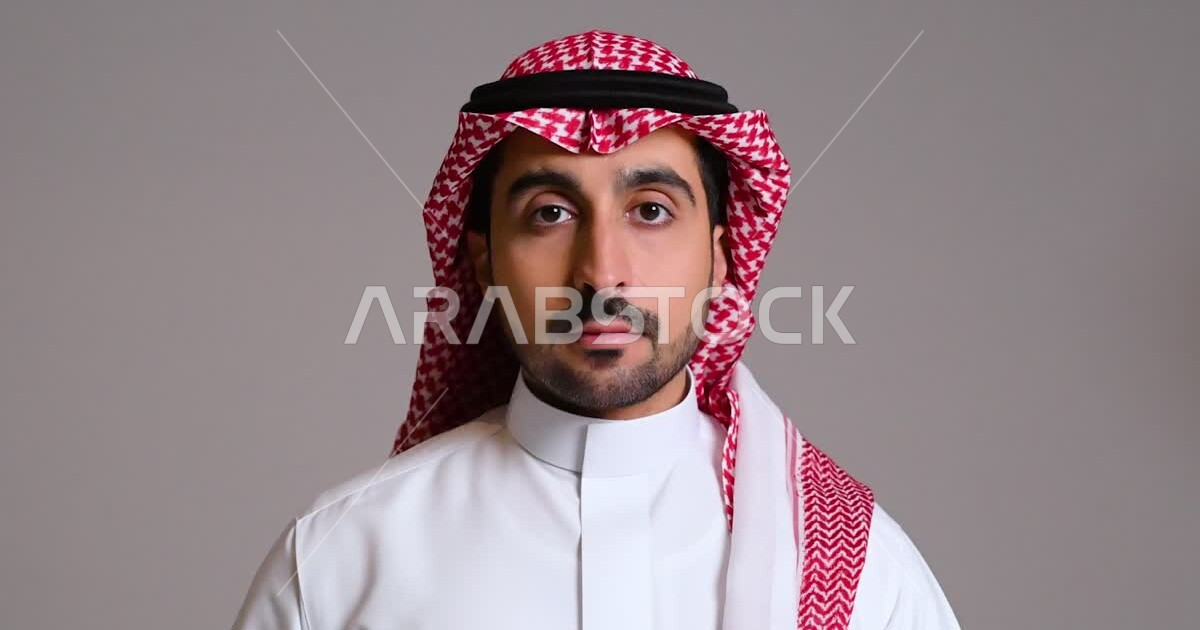Celebrating International Men’s Day, a close-up portrait of a Saudi ...