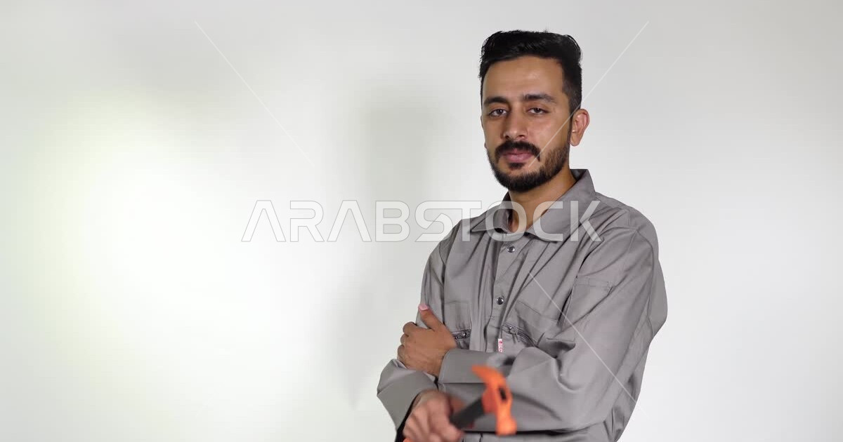 Portrait of a young Saudi Gulf man working as a technical engineer ...
