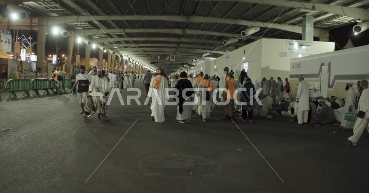 Pilgrims of the Holy House of God wearing the Ihram dress in the area ...