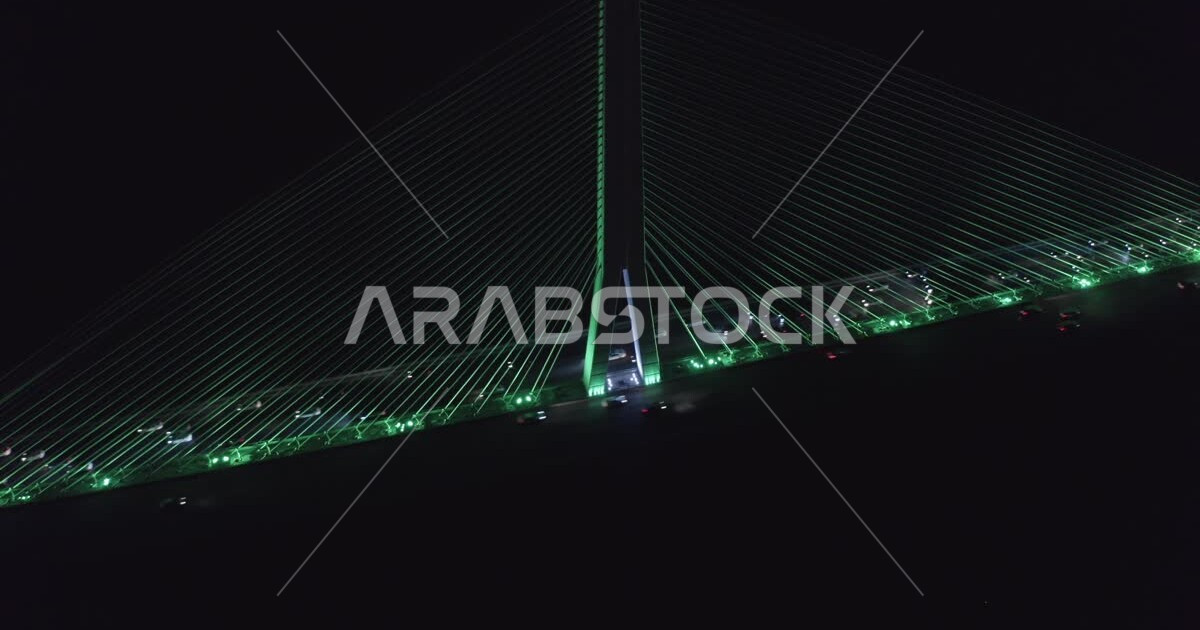 Traffic and cars at night, aerial drone photography of the cable-stayed ...