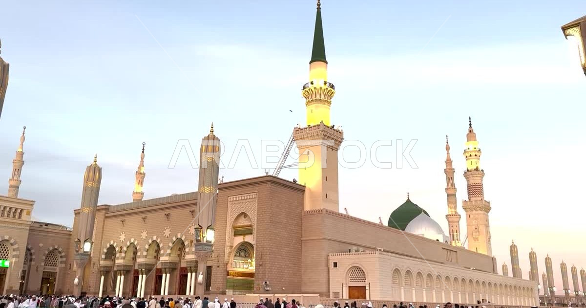 The Prophet’s Mosque in Medina, a close-up of visitors to the Mosque of ...
