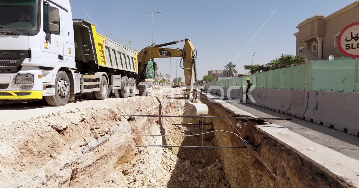 Digging foundations for buildings and large structures using heavy equipment, a bulldozer ...