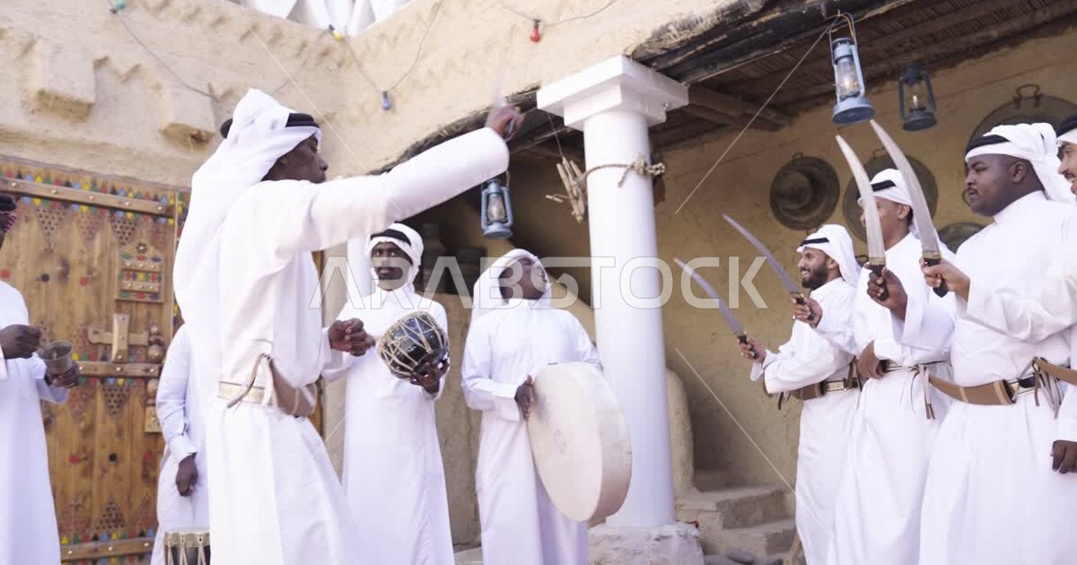 Wearing the popular Najdi parade costumes, celebrating the founding of ...
