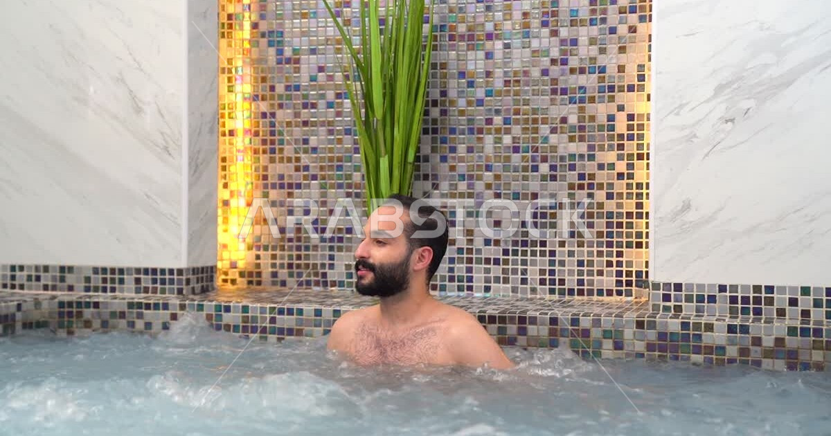 A young Saudi Arabian Gulf enjoying one of the spa centers in Saudi ...