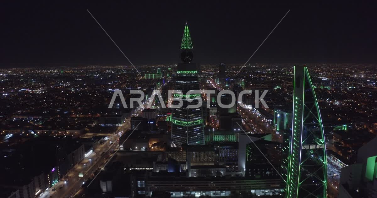 Al Faisaliah Tower building lit in green on Saudi National Day on ...
