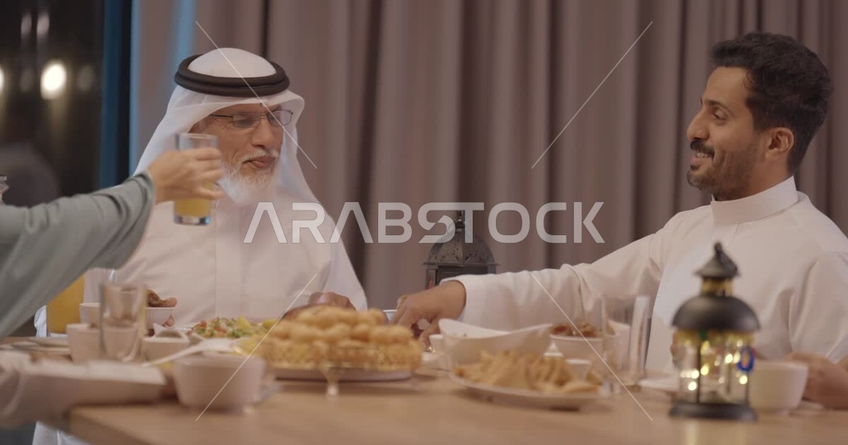 A happy family Ramadan breakfast, a close-up of a Saudi Arabian Gulf ...