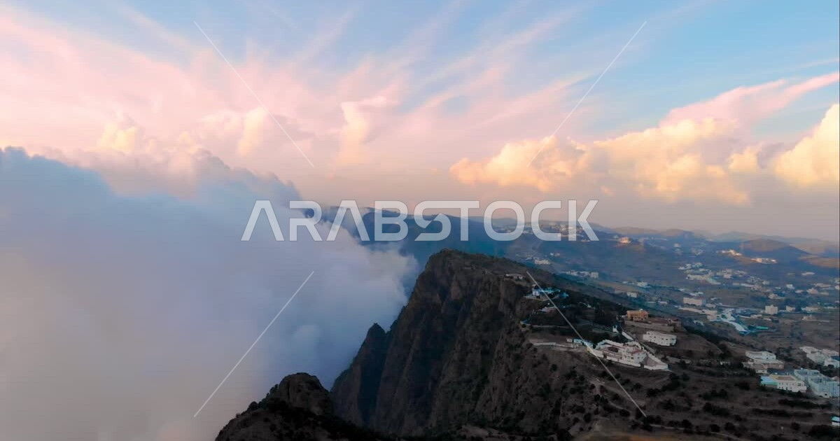 The movement of clouds and clouds over the mountains of the Al-Souda ...