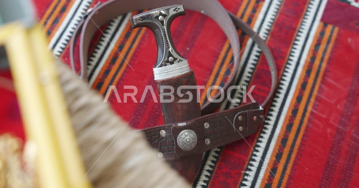 Our Day 1727 AD, a close-up depiction of the daqla and the dagger on a ...