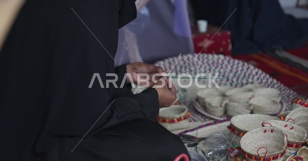 Women's crafts and crafts, a close-up of the hand of a Saudi Arabian ...