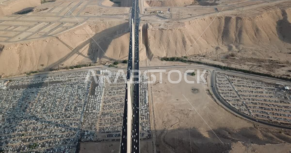 Aerial drone photography of the suspension bridge in the city of Riyadh ...