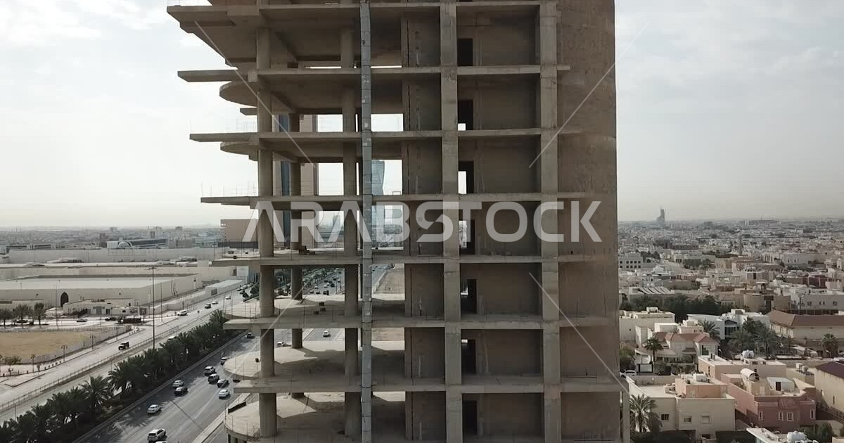 Close-up drone photography of a building under construction overlooking ...