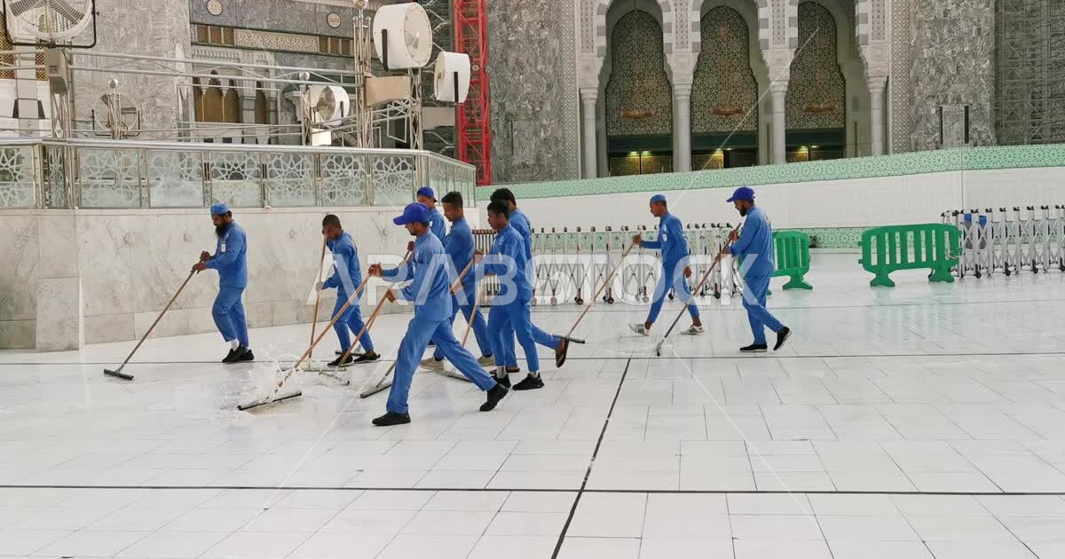 Attention to the cleanliness of the Holy Mosque in Mecca, a group of ...