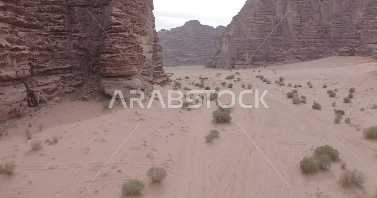 Landscapes of golden sand, carved mountains and mountain formations in ...