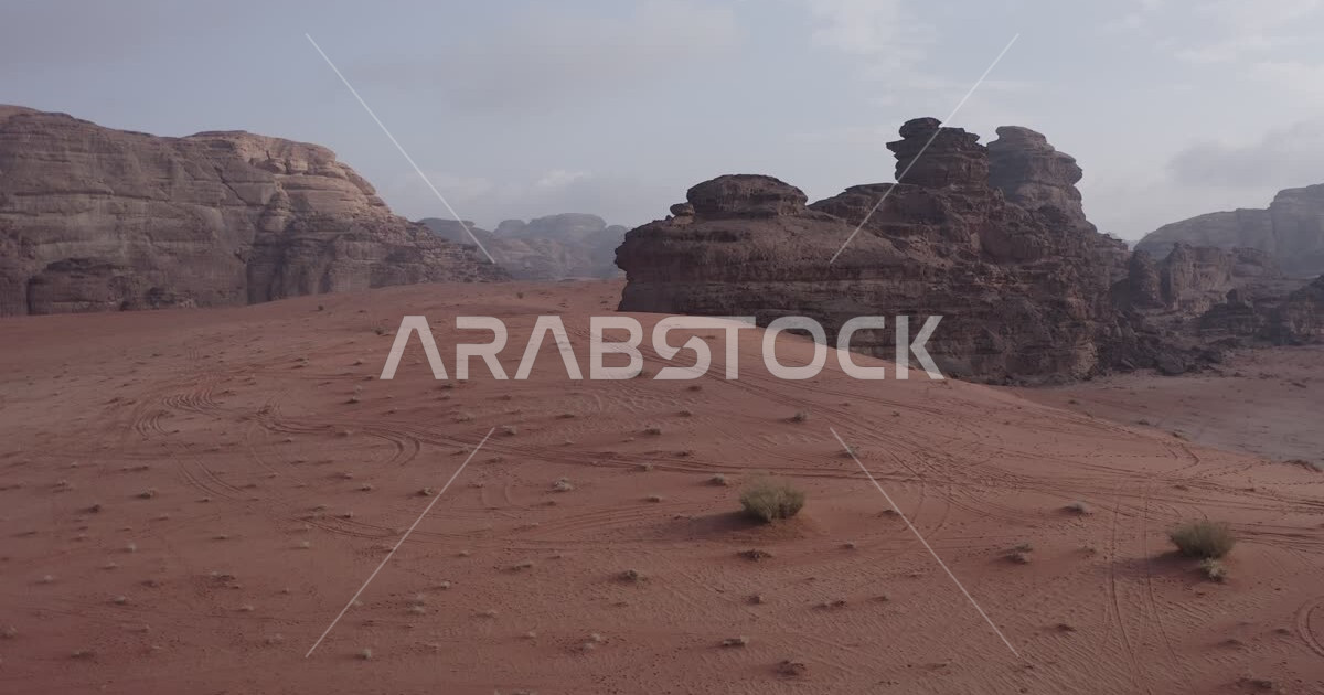 Landscapes of golden sand, carved mountains and mountain formations in ...