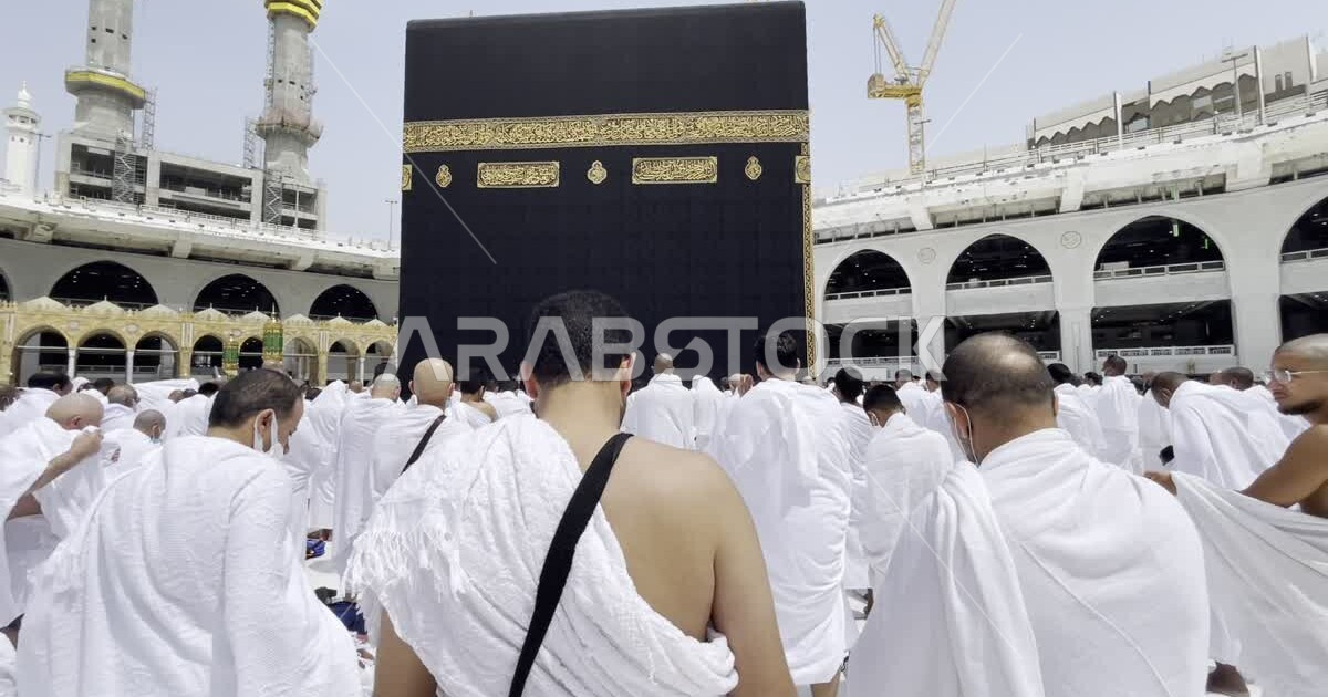 Performing prayer in the Holy Mosque in Mecca in the Kingdom of Saudi ...