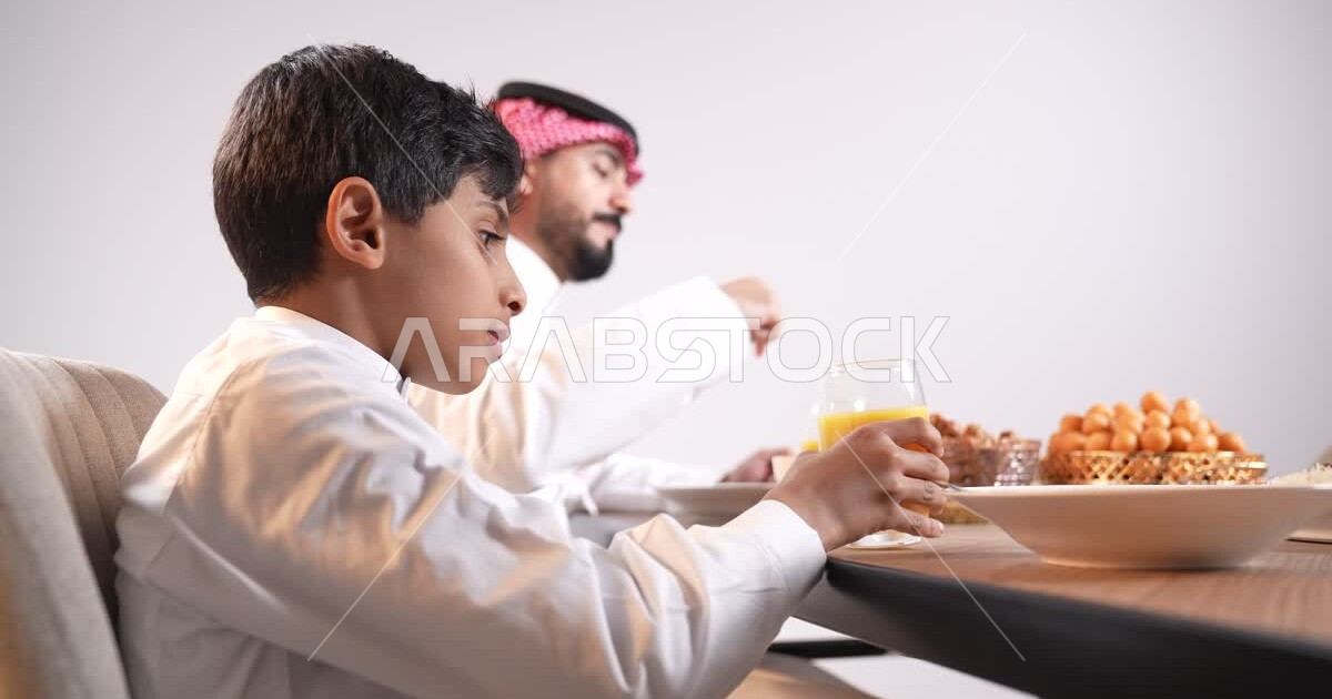 Delicious Ramadan hospitality, a golden-colored luqaimat dish, oriental ...