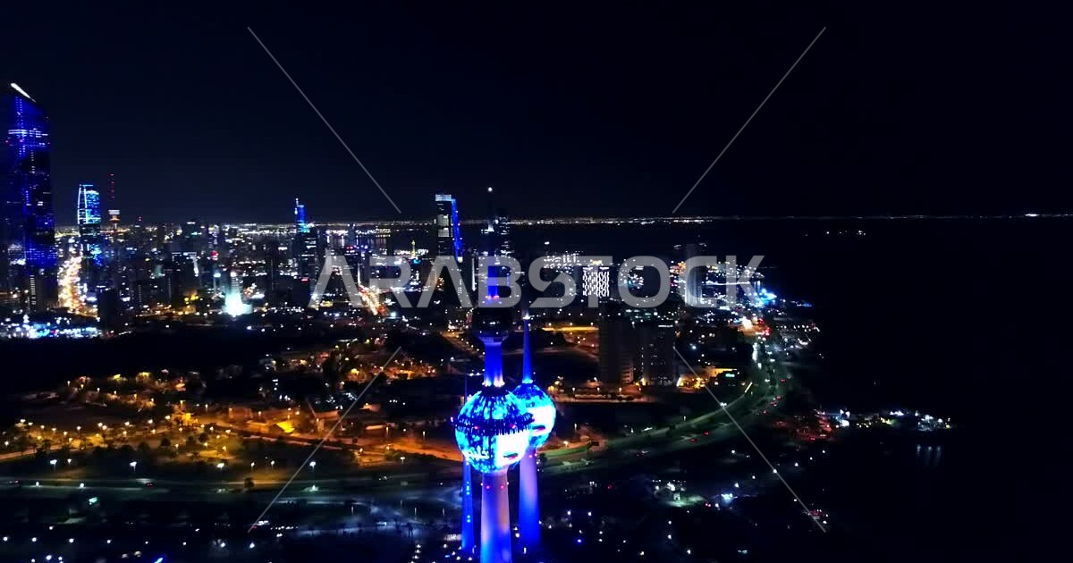 Kuwait Towers illuminated at night, architectural art of towers ...