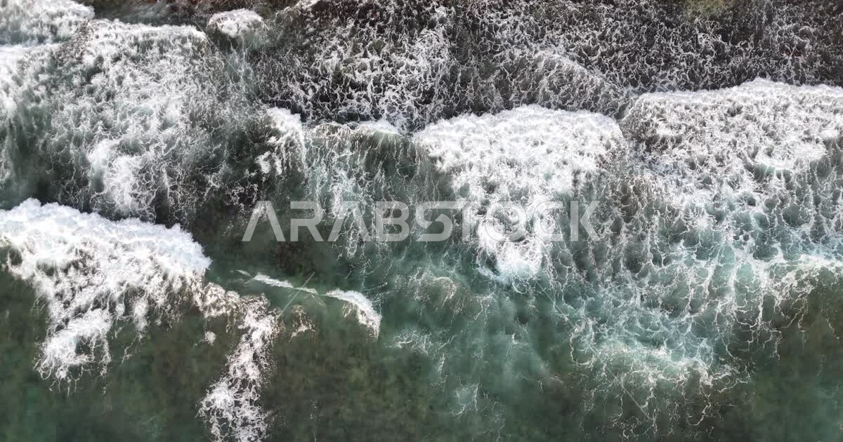 Drone photography of calm waves in the sea of Jeddah at sunset, famous ...