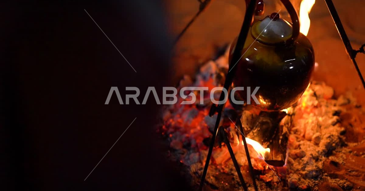 A popular camp With a firewood torch in the deserts of Saudi Arabia, A ...