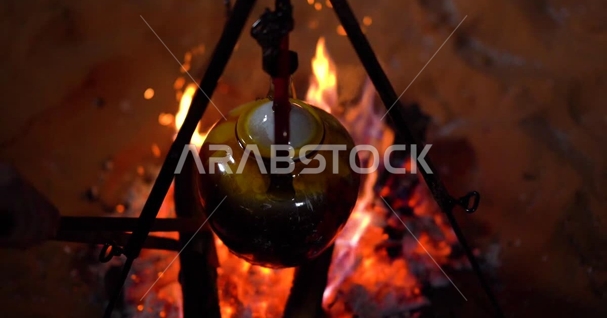 A popular camp With a firewood torch in the deserts of Saudi Arabia, A ...