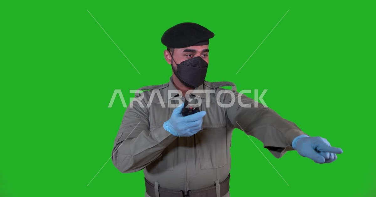 Using transmitter, wearing security suit, Arab Gulf Emirati forensic ...