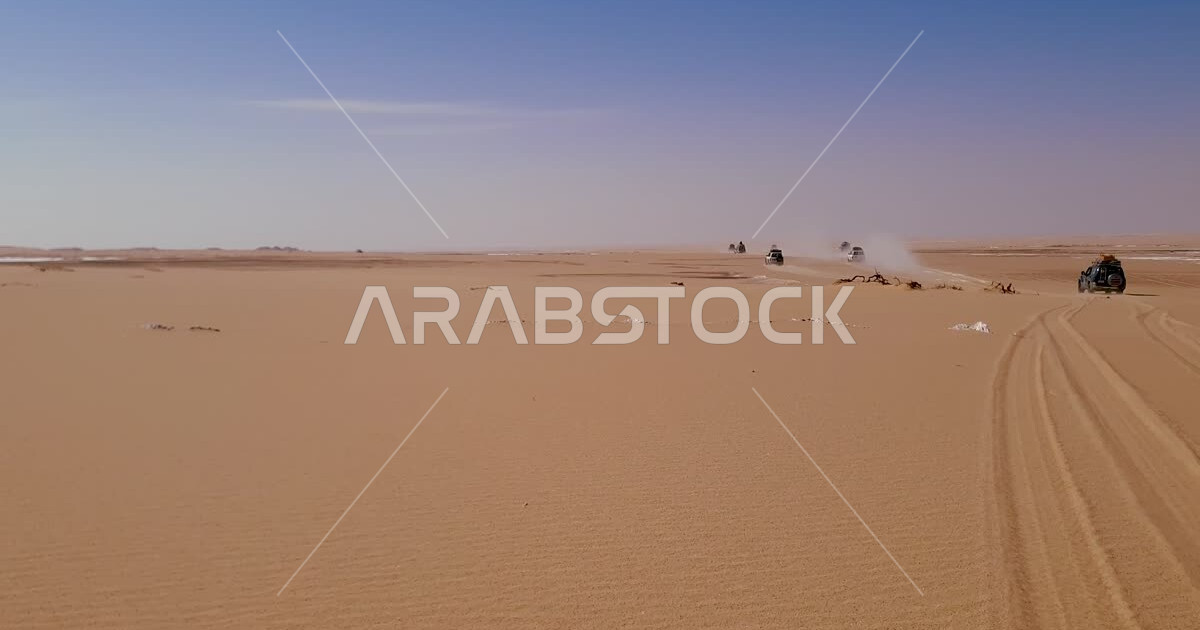 Driving four-wheel drive vehicles (drifting) in the middle of the ...