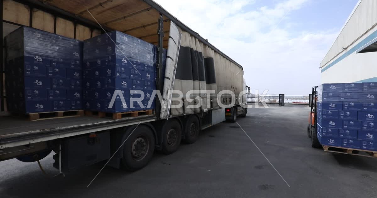 The stage of packing boxes inside trucks and vehicles for shipping and ...