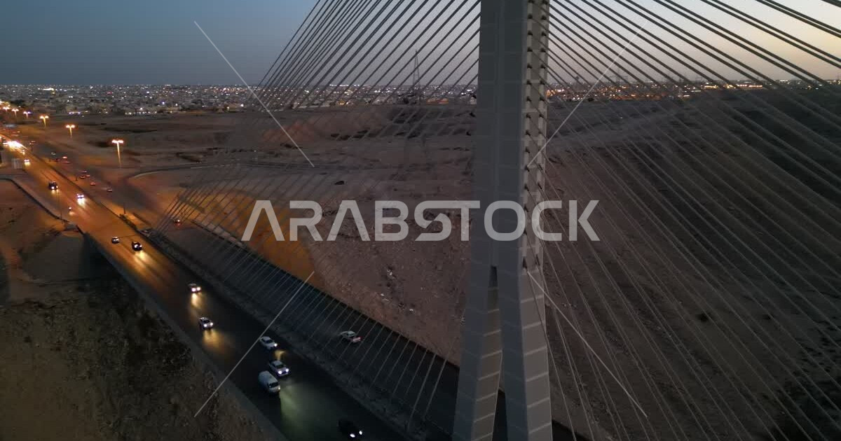 Advanced architectural engineering, traffic and cars during the day ...