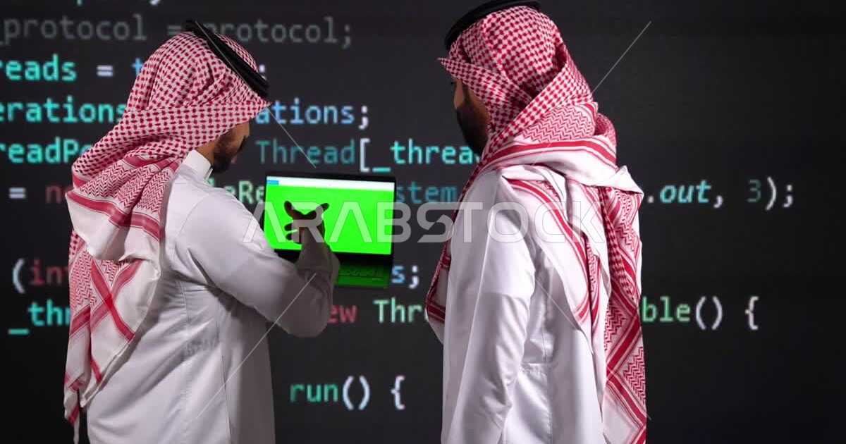 Saudi Gulf staff working as a web developer, using a variety of ...